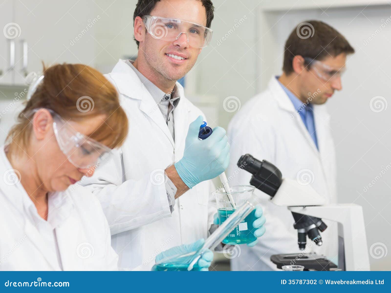 Group of Scientists Working at the Laboratory Stock Photo - Image of ...