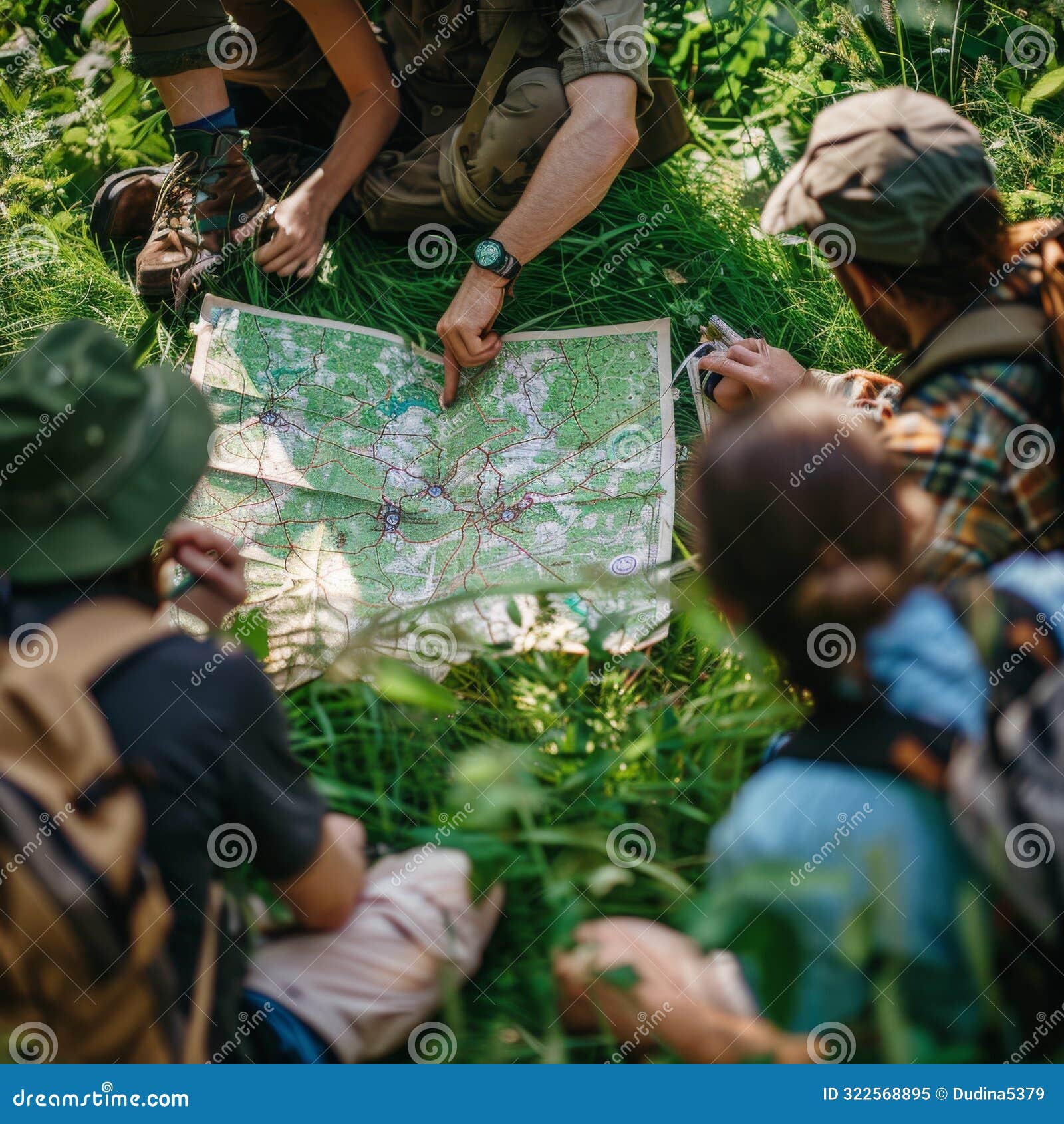 Scouts with Backpacks Planning Route on Map in Nature Stock ...