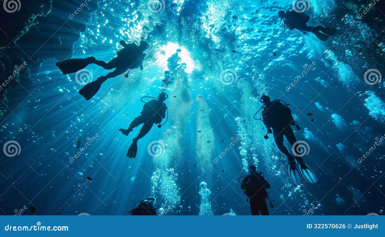 A Group of Scuba Divers Venturing into the Eerie Depths of a Blue Hole ...
