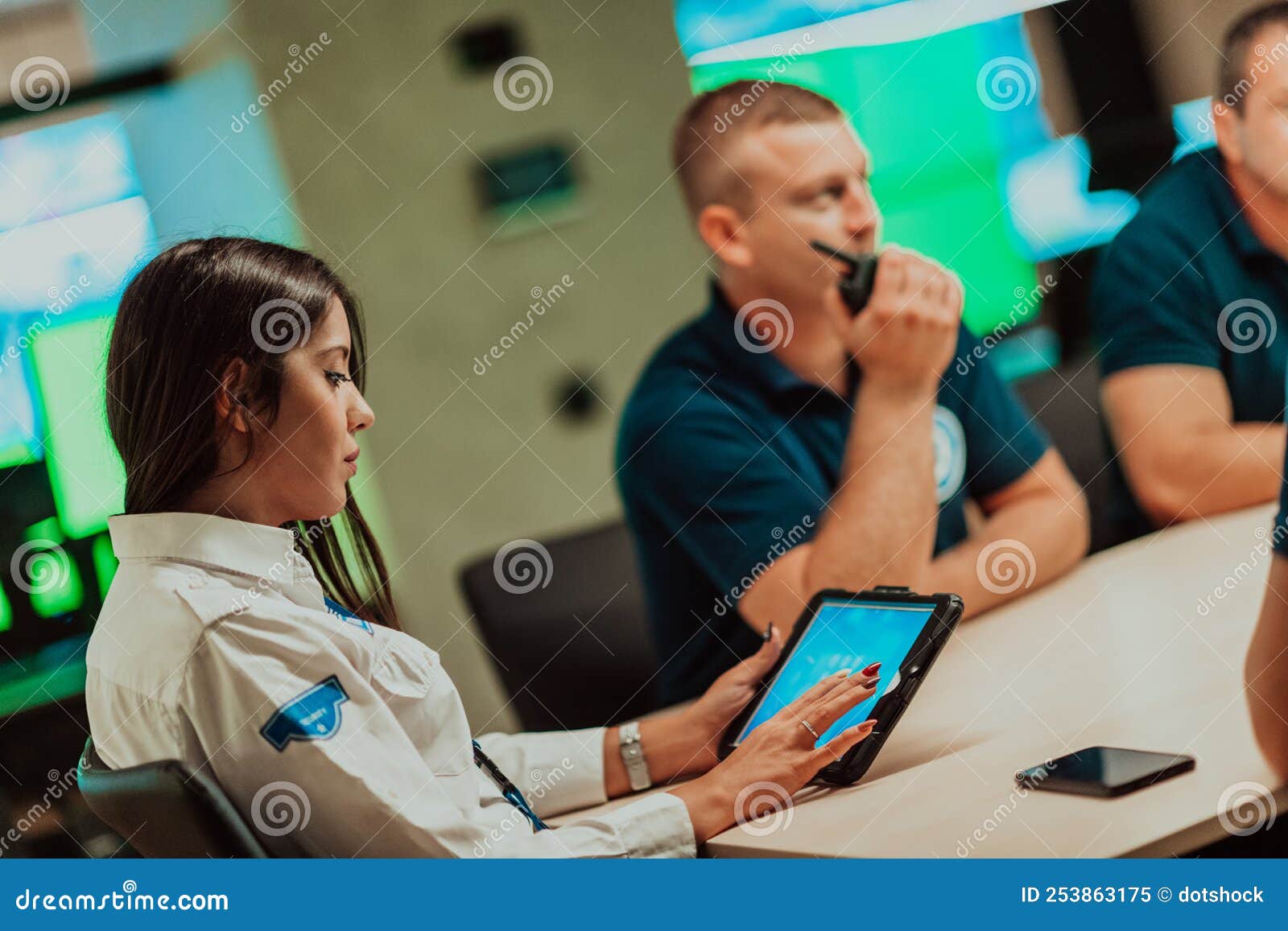 Group of Security Guards Sitting and Having Briefing in the System ...