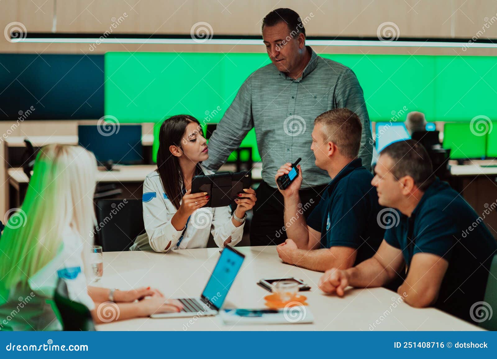Group of Security Guards Sitting and Having Briefing in the System ...