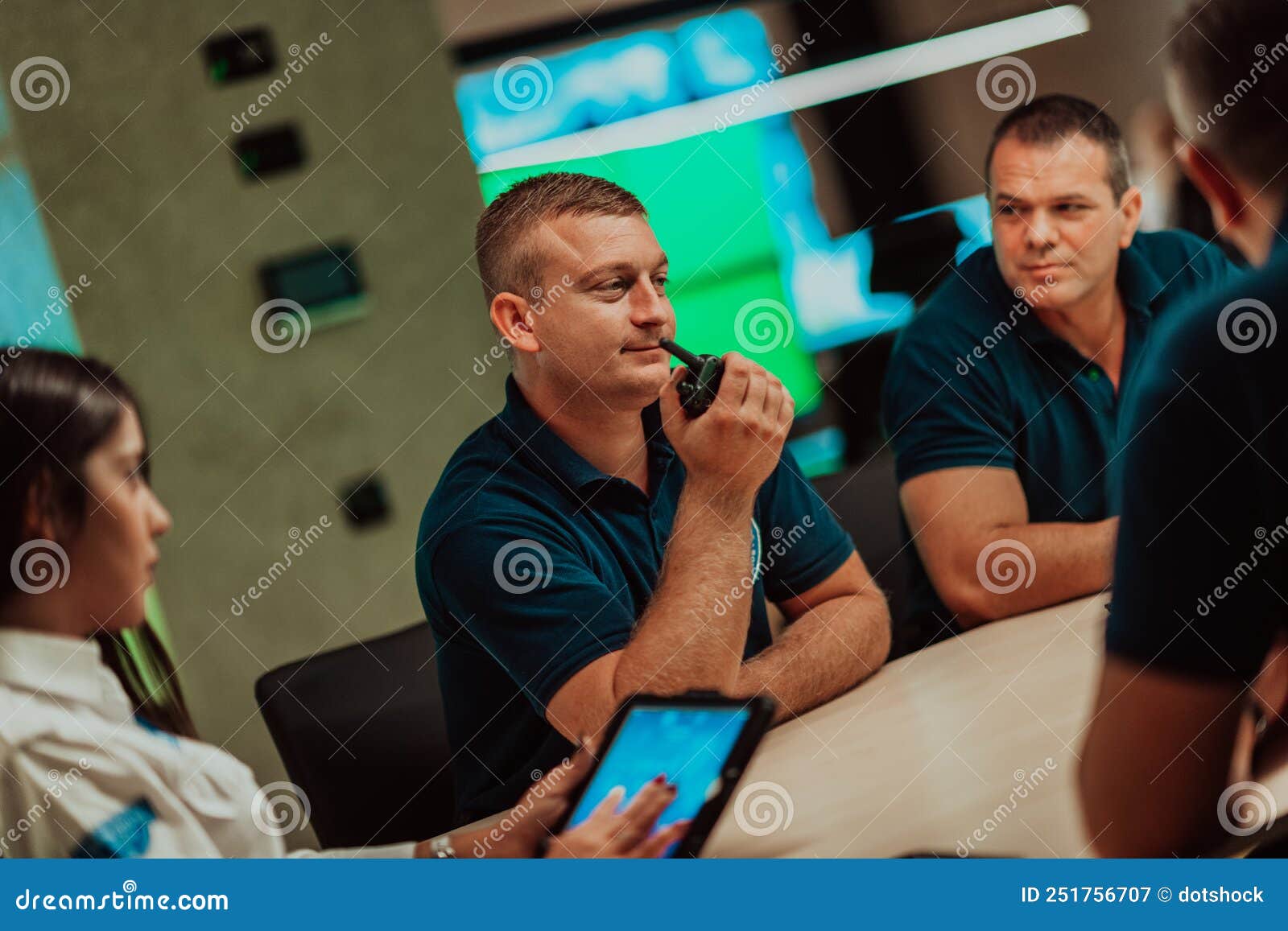 Group of Security Guards Sitting and Having Briefing in the System ...