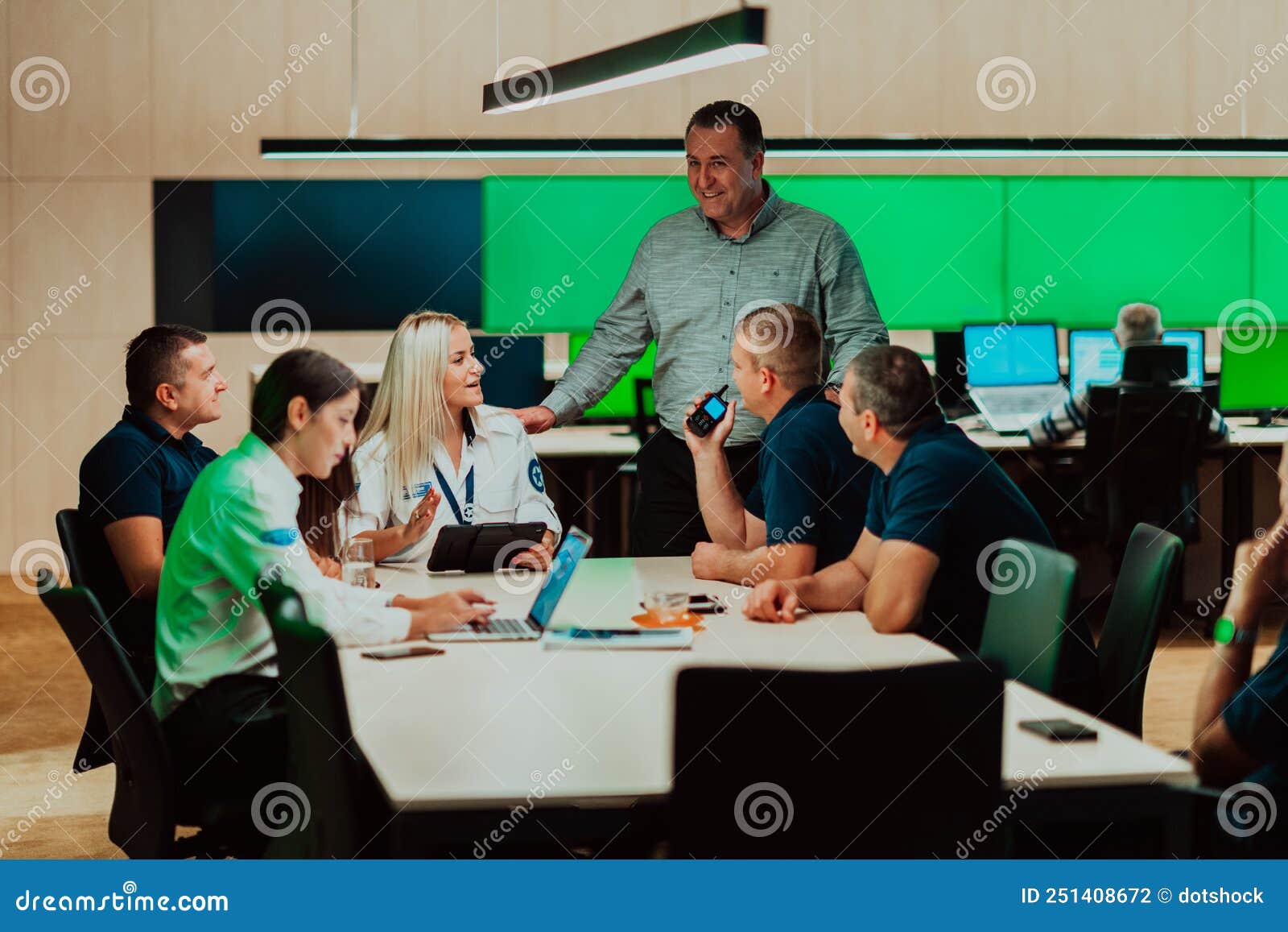Group of Security Guards Sitting and Having Briefing in the System ...