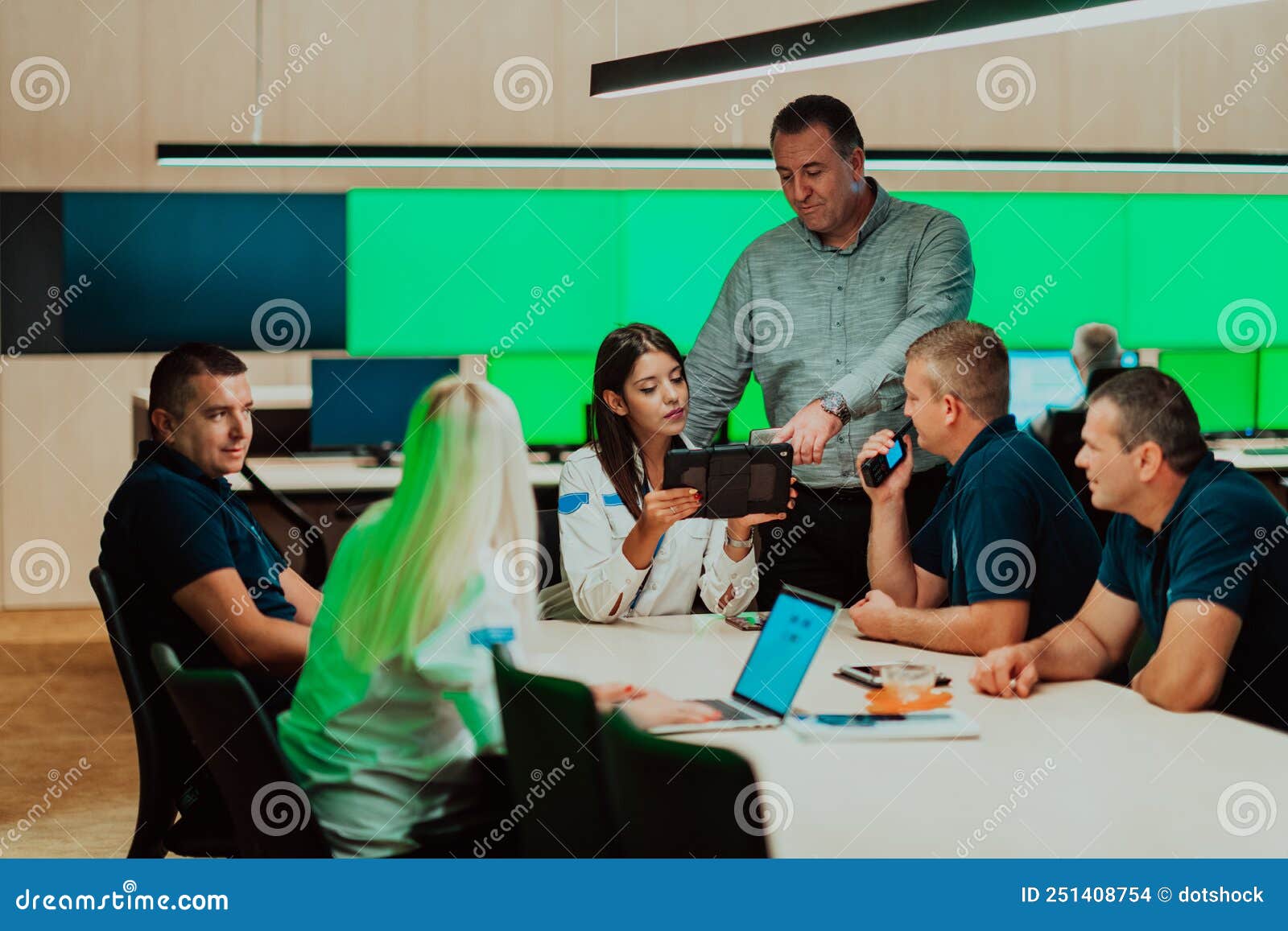 Group of Security Guards Sitting and Having Briefing in the System ...
