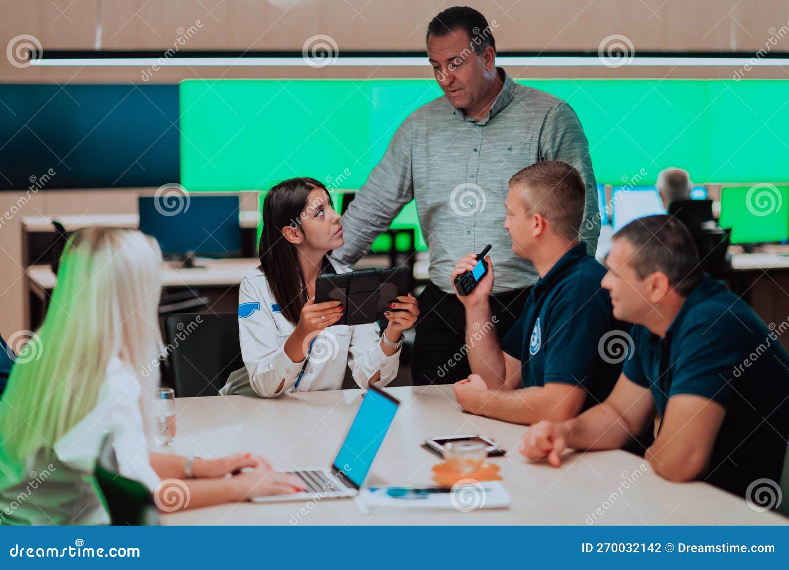 Group of Security Guards Sitting and Having Briefing in the System ...