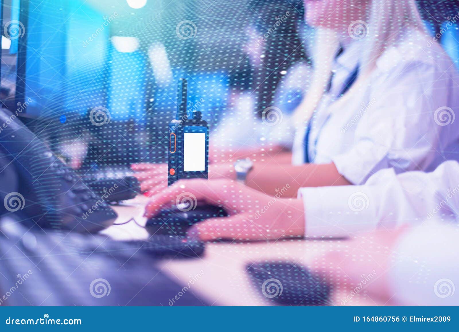 Group of Security Guards Working on Computers while Sitting in the Main ...