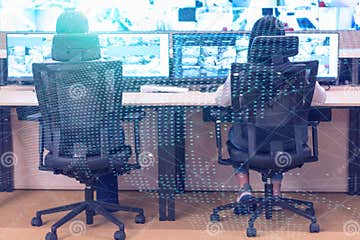 Group of Security Guards Working on Computers while Sitting in the Main ...