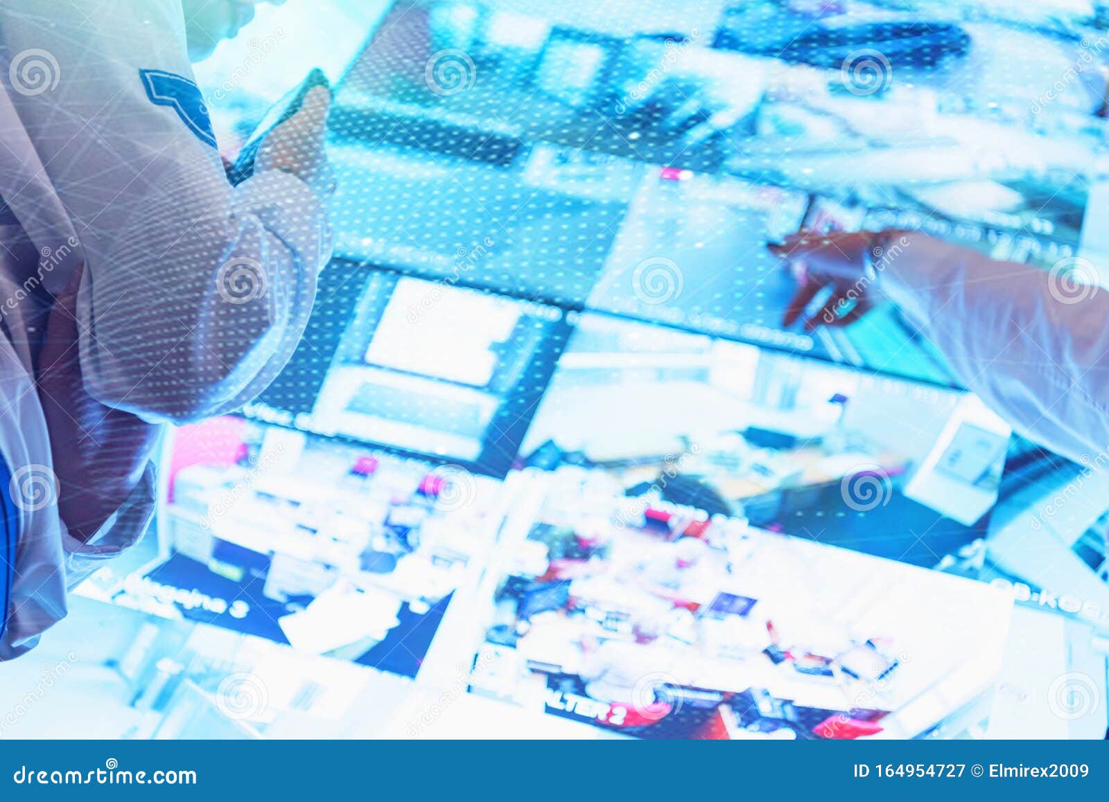 Group of Security Guards Working on Computers while Sitting in the Main ...