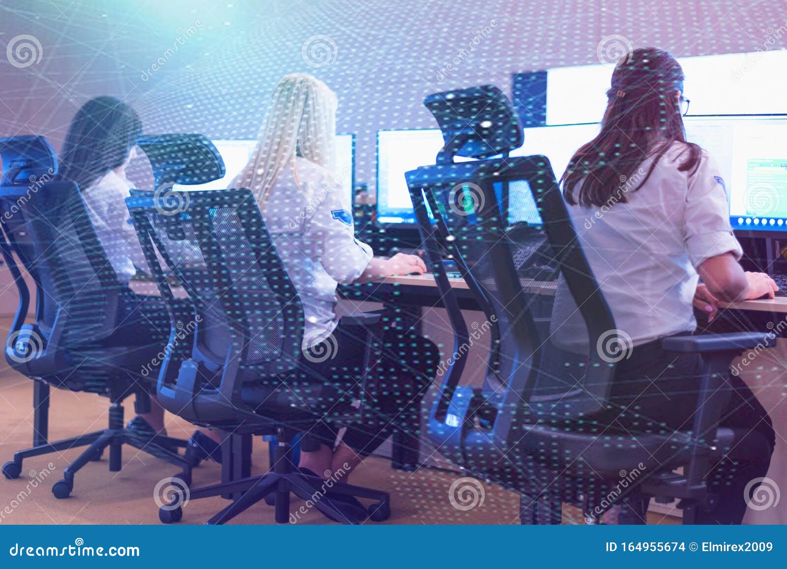 Group of Security Guards Working on Computers while Sitting in the Main ...
