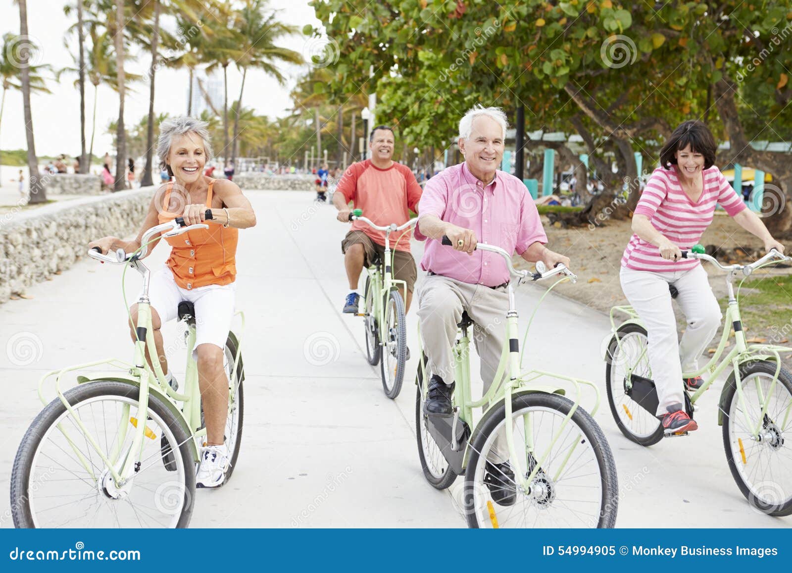 Group of Senior Friends Having Fun on Bicycle Ride Stock Image - Image ...