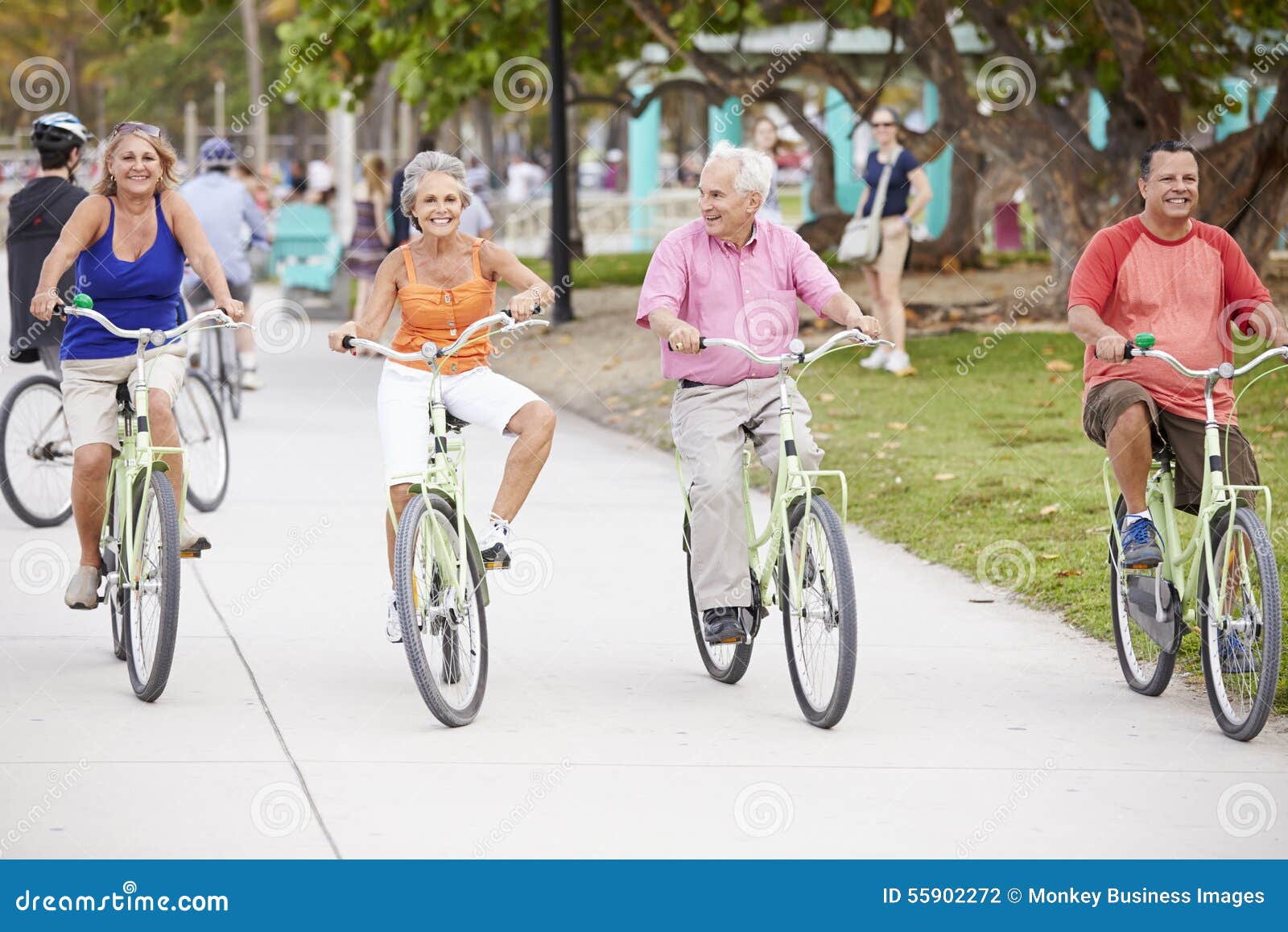 Group of Senior Friends Having Fun on Bicycle Ride Stock Photo - Image ...