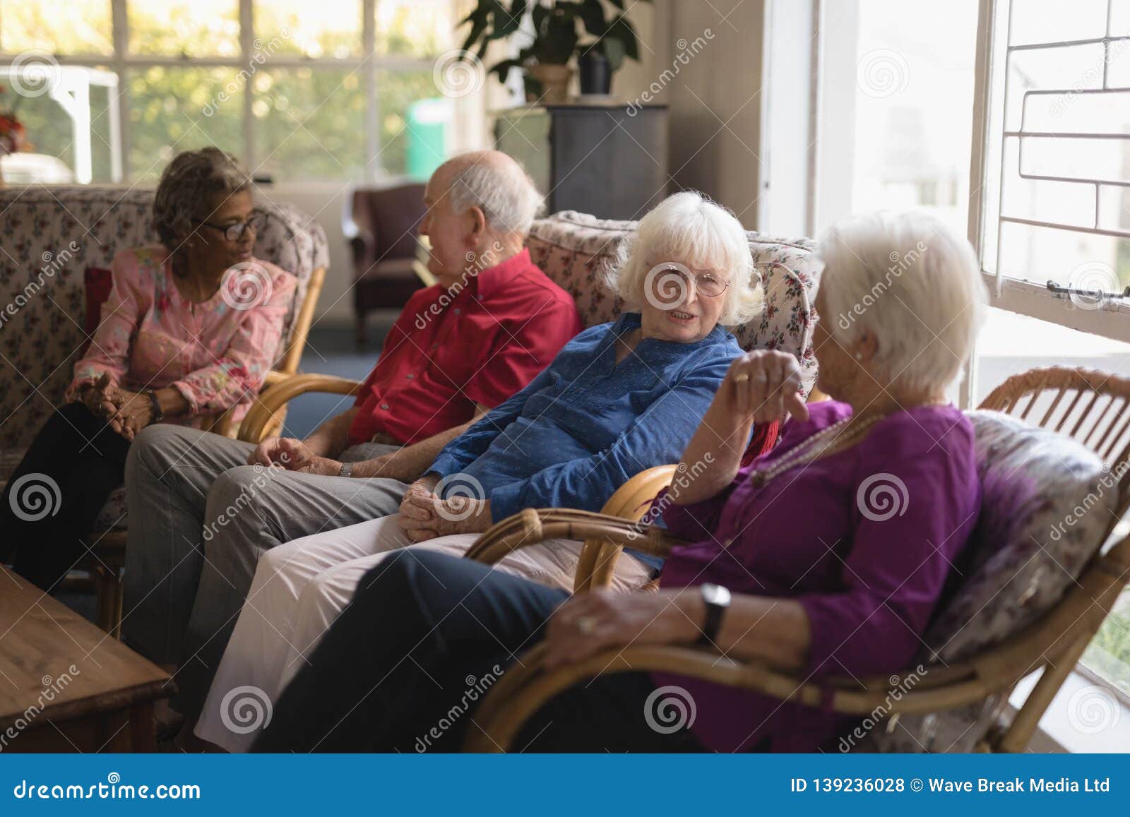 Group of Senior Friends Interacting with Each Other at Nursing Home ...
