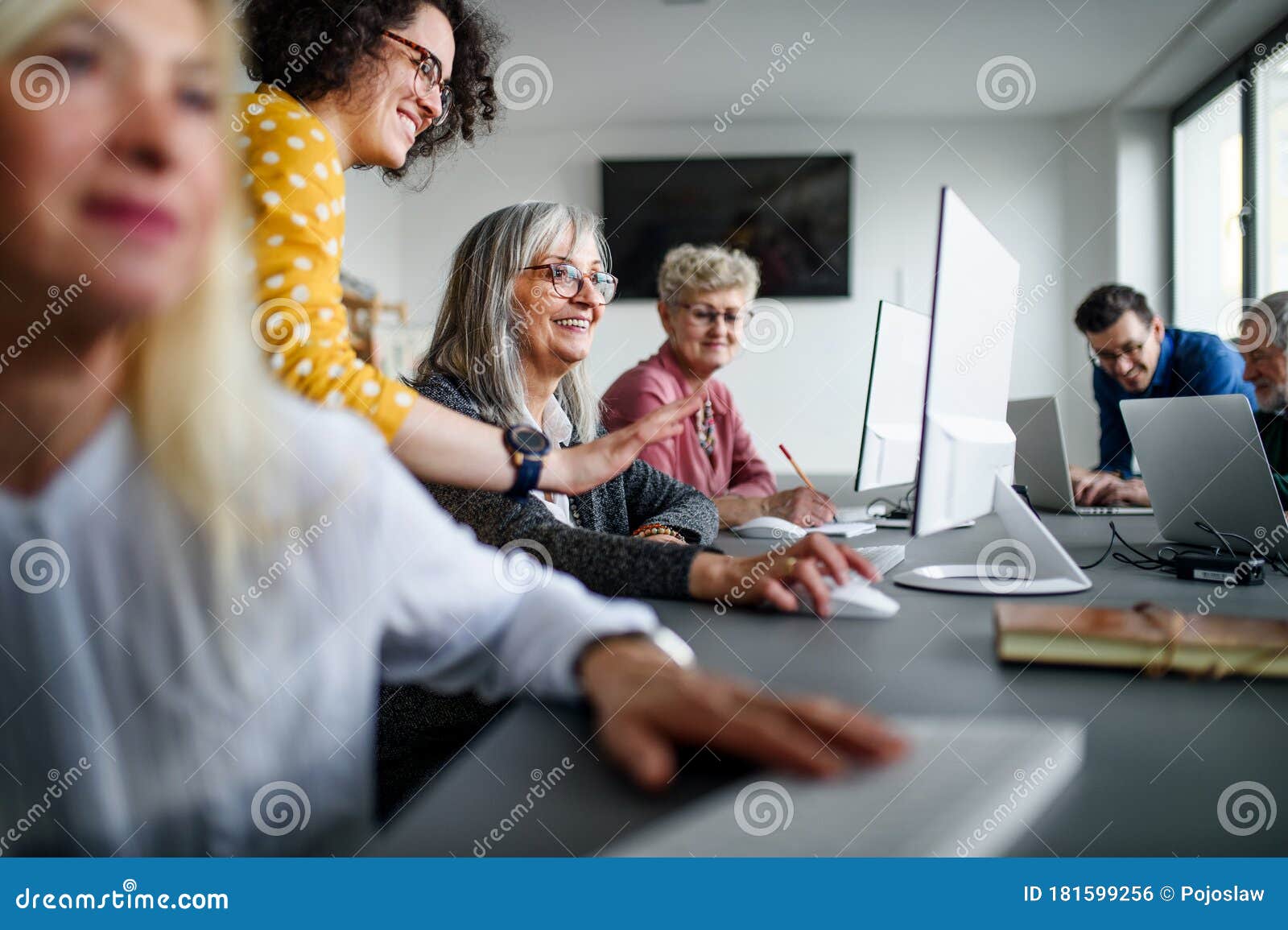 Group of Senior People Attending Computer and Technology Education ...