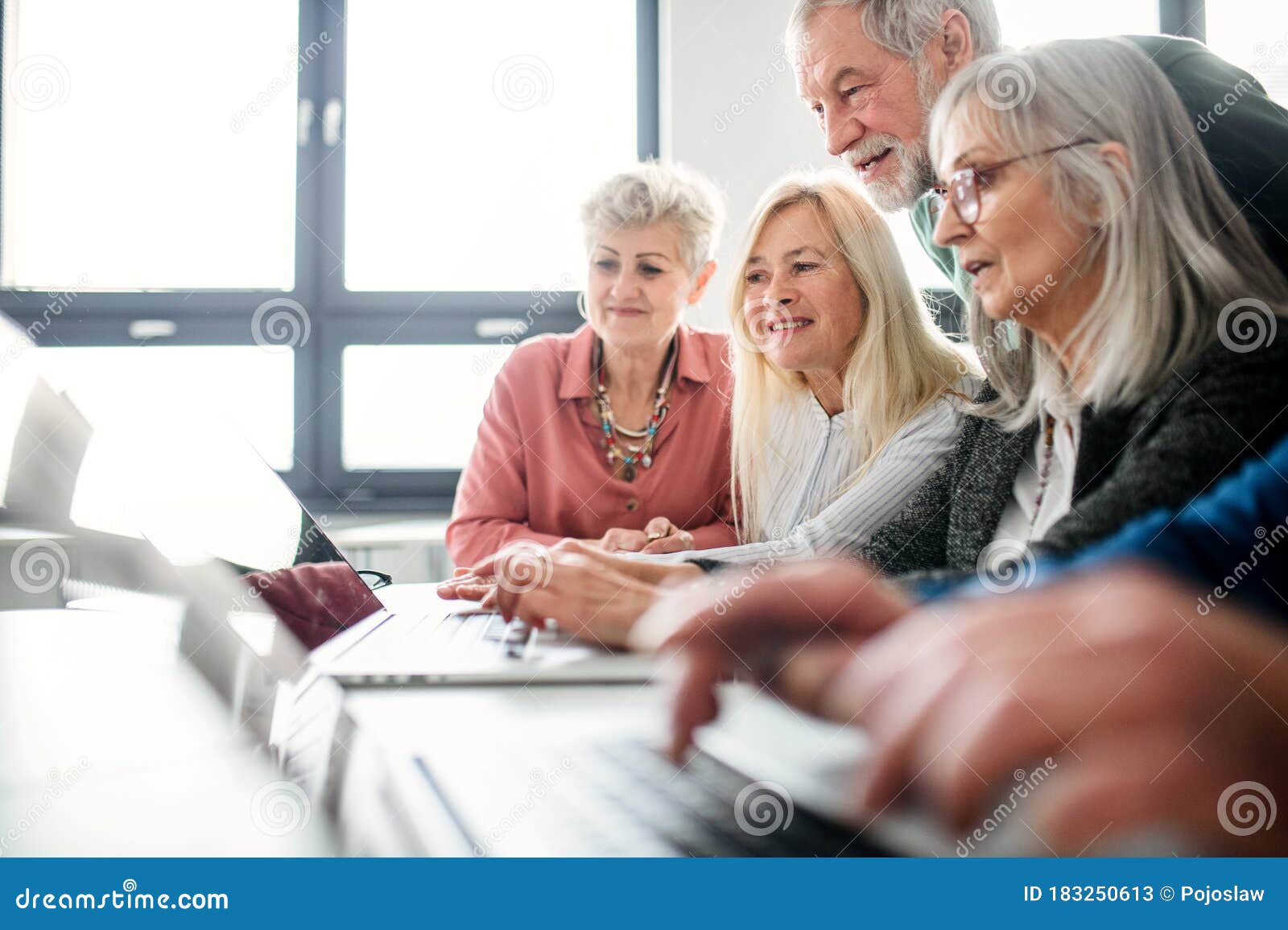 Group of Senior People Attending Computer and Technology Education ...
