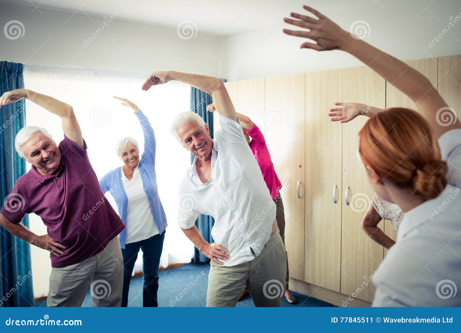Group of Seniors Doing Exercises with Nurse Stock Image - Image of ...