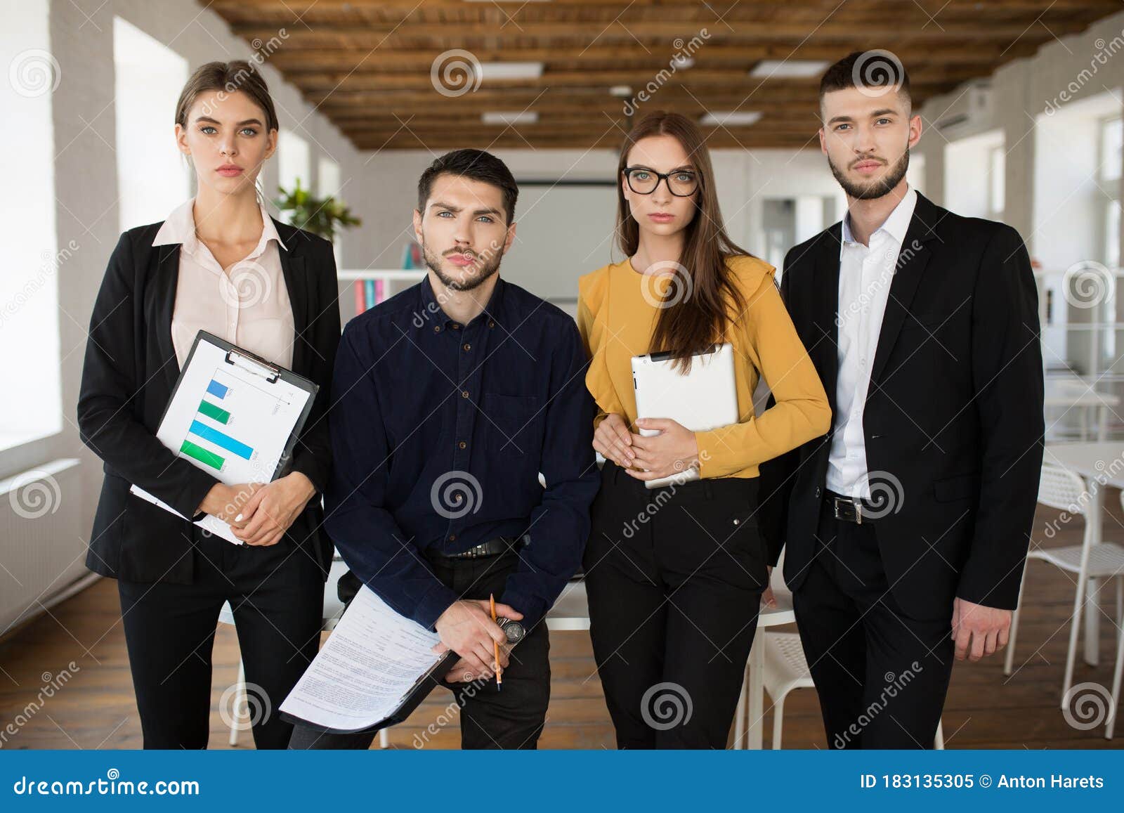 Group of Serious Business People in Suits Thoughtfully Looking in ...