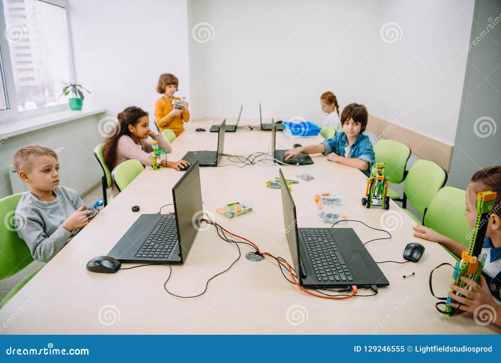 Group of Serious Kids Working with Computers Stock Image - Image of ...
