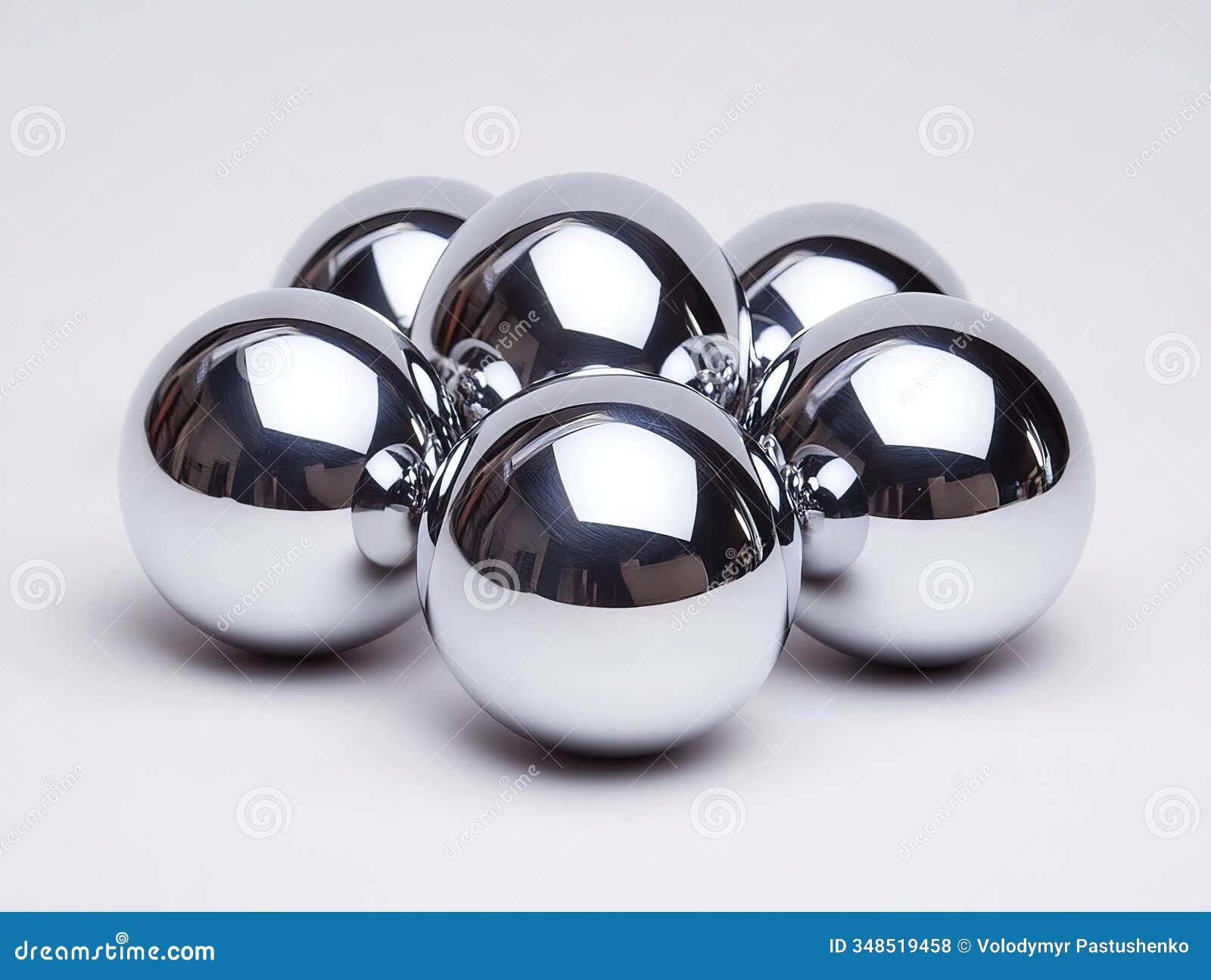 A Group of Shiny Silver Balls on a White Surface Stock Photo - Image of ...