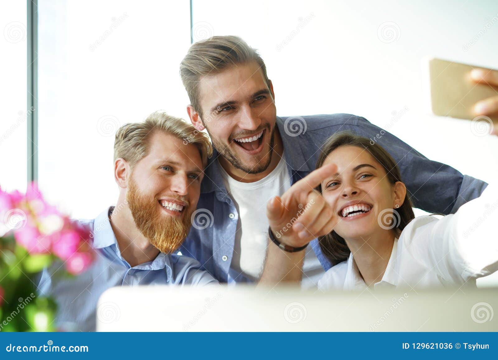 Group Shot of Colleagues Having Fun in Their Office. Stock Photo ...