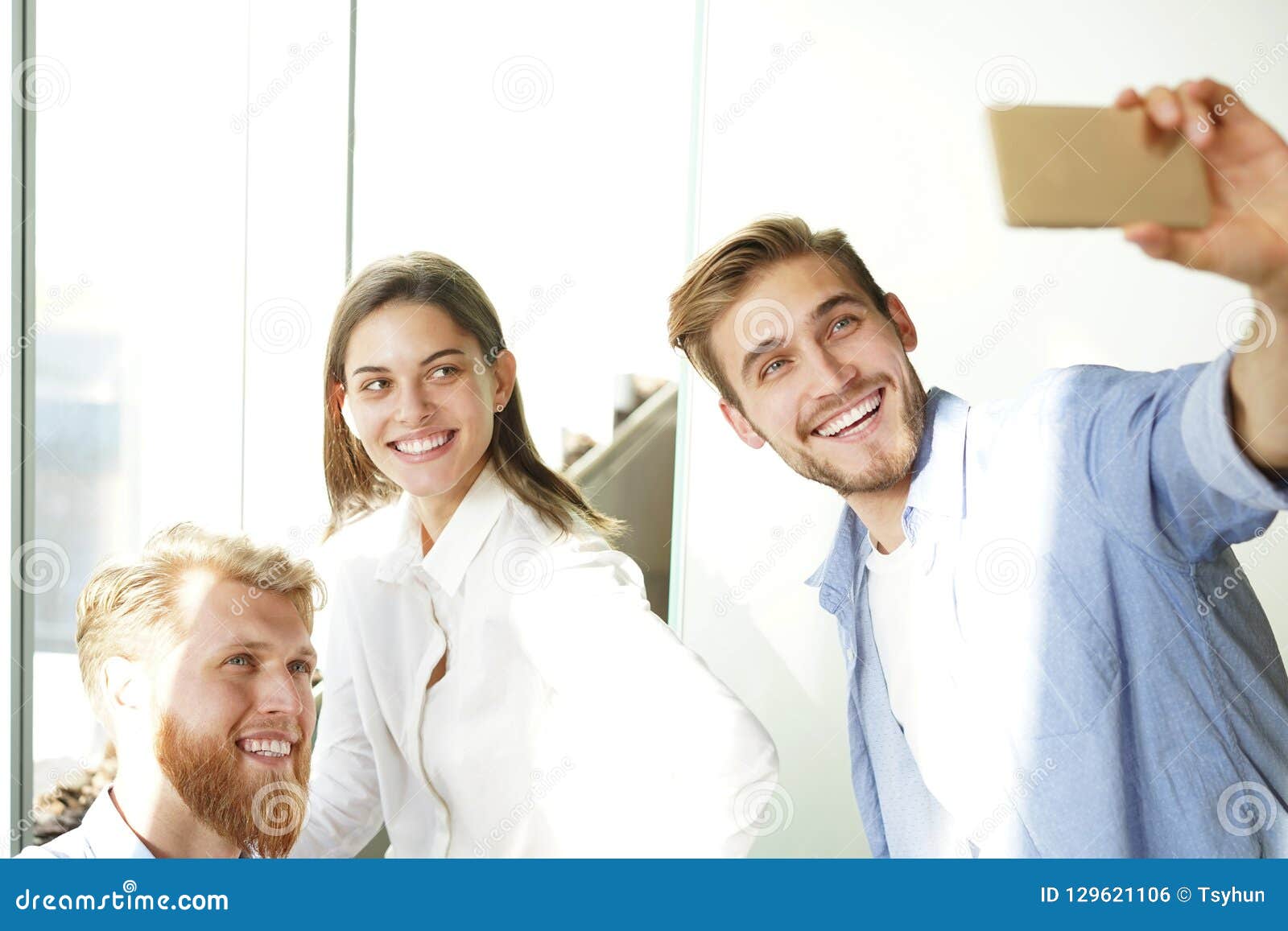 Group Shot of Colleagues Having Fun in Their Office. Stock Photo ...