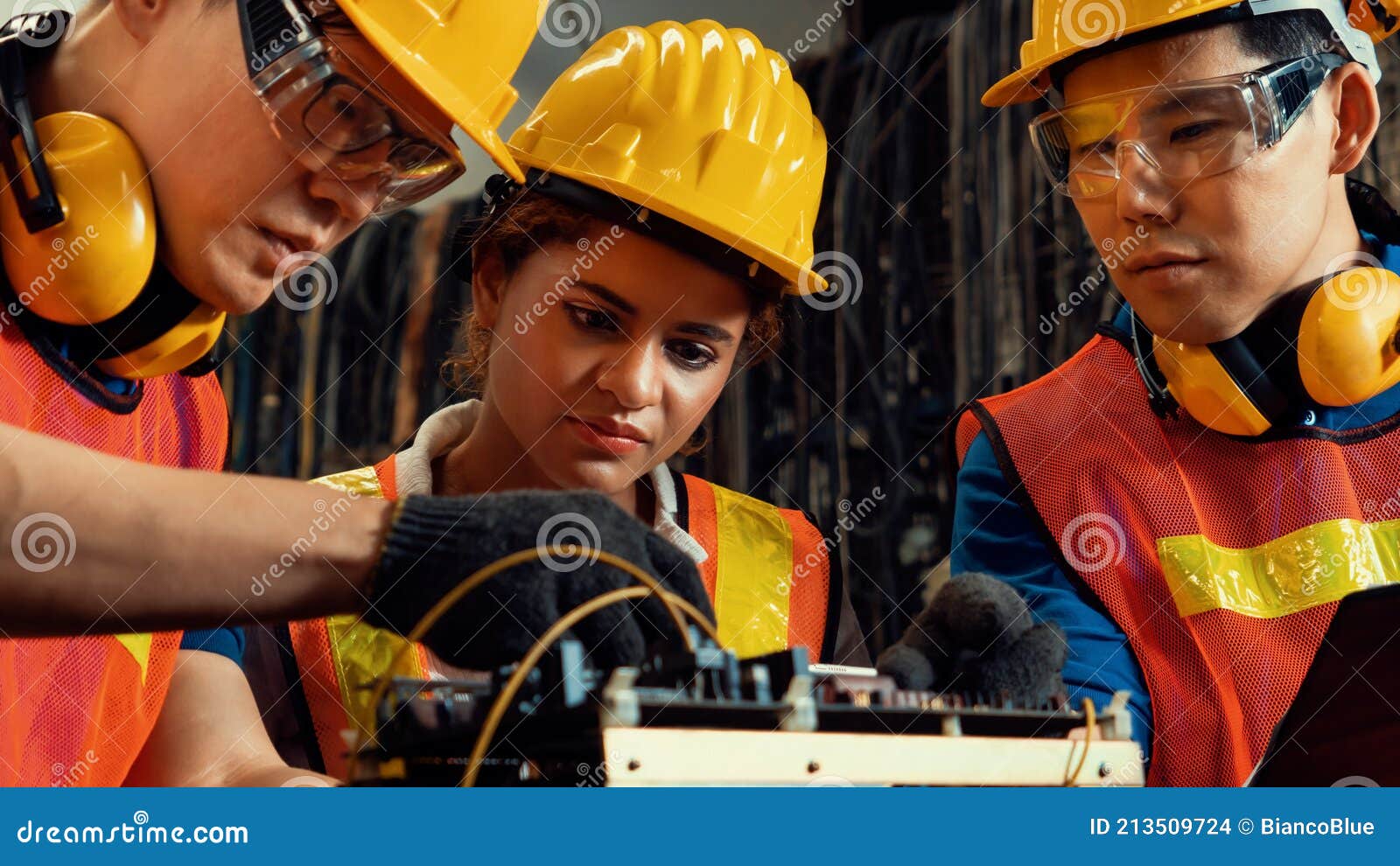 Group of Skillful Workers Using Machine Equipment in Factory Workshop ...