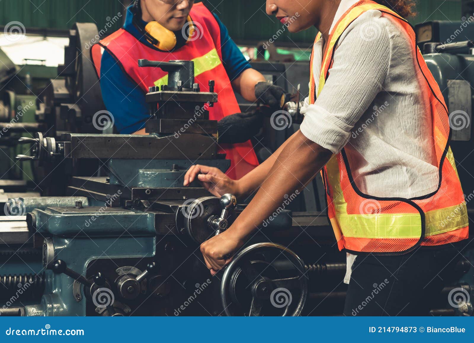 Group of Skillful Workers Using Machine Equipment in Factory Workshop ...