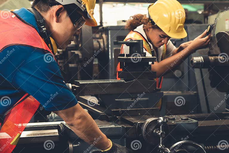 Group of Skillful Workers Using Machine Equipment in Factory Workshop Stock Image - Image of ...