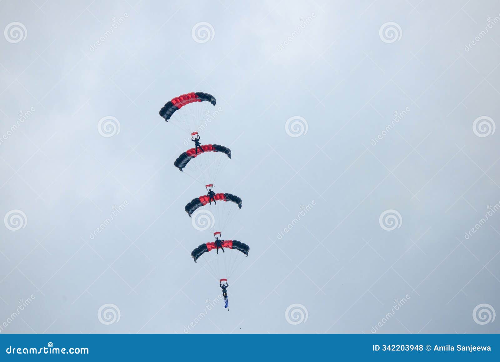 Group of Skydivers Forms a Precise Formation in the Sky Stock Photo ...