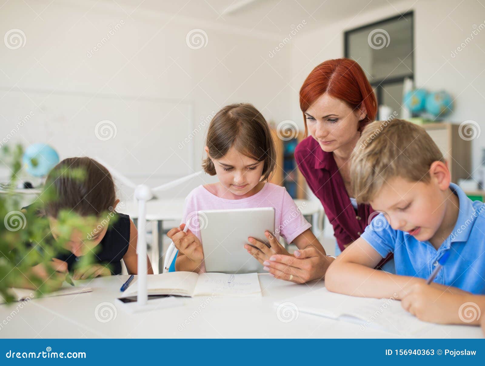 Group of Small School Kids with Teacher Sitting in Circle in Class ...