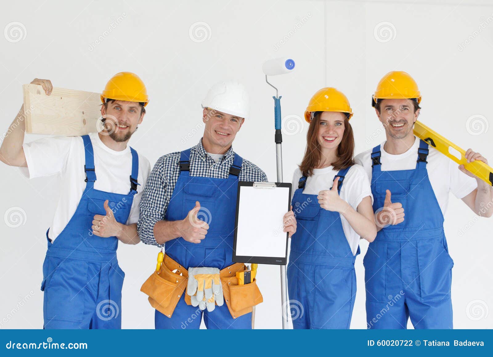 Group of smiling builders stock photo. Image of builder - 60020722