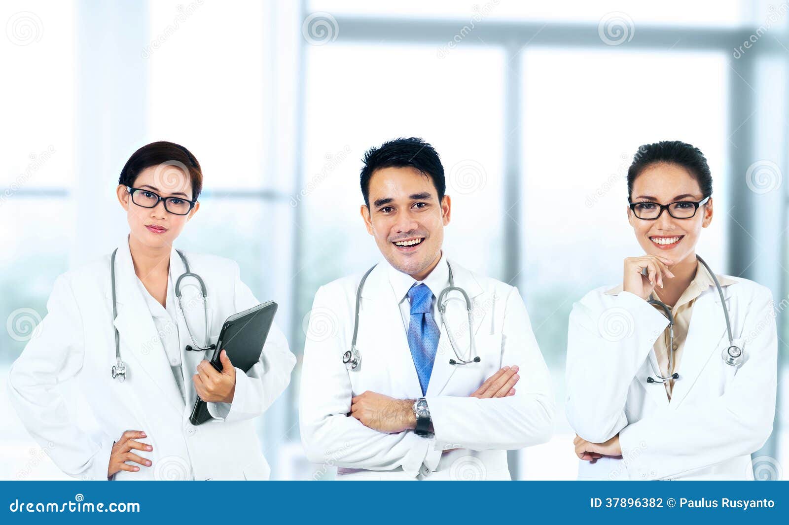 Group of smiling doctors stock photo. Image of adult - 37896382