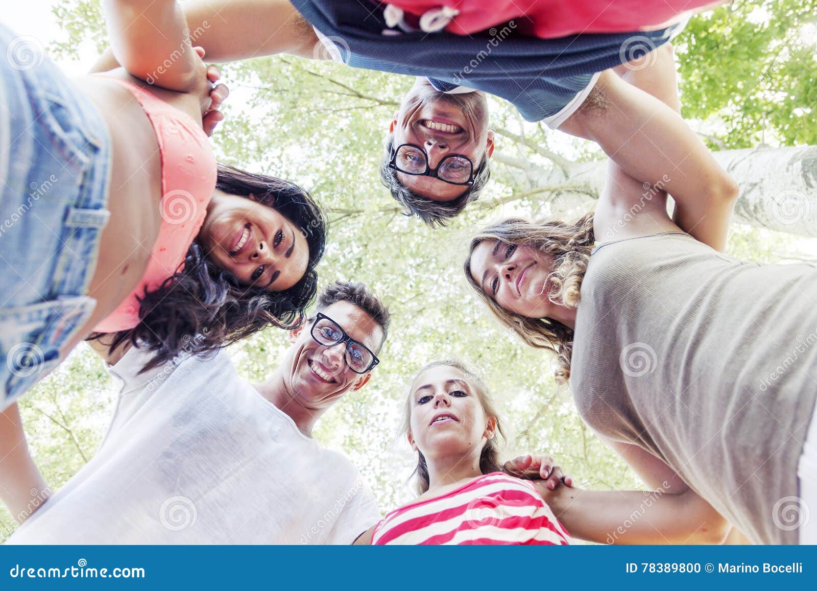 Group of Smiling Friends in Circle - Bottom View Stock Photo - Image of ...