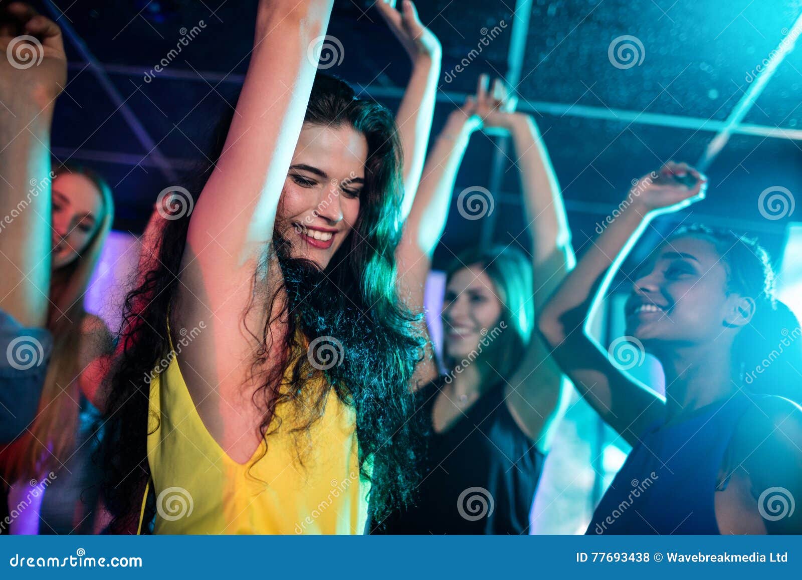 Group of Smiling Friends Dancing on Dance Floor Stock Photo - Image of ...