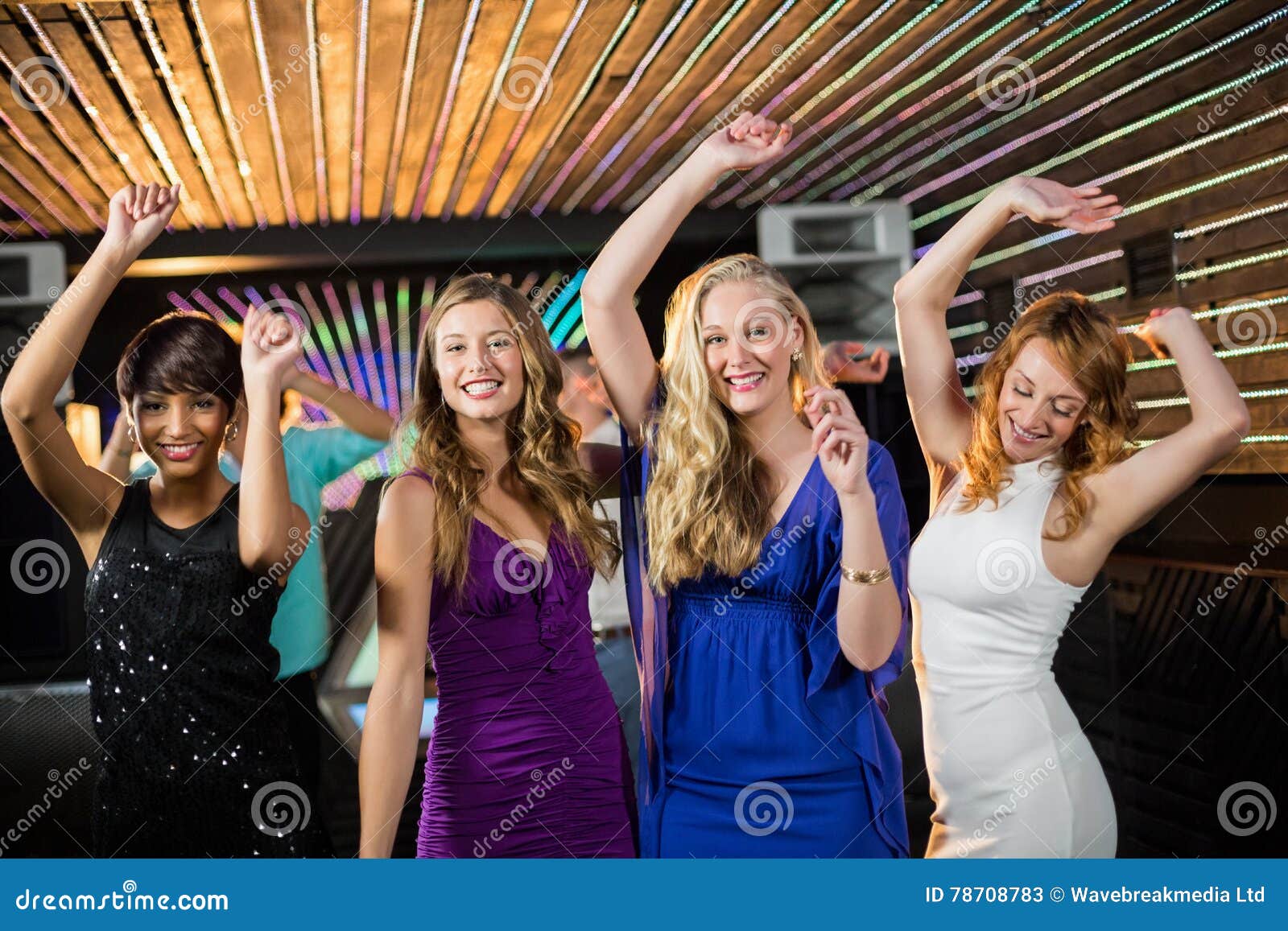 Group of Smiling Friends Dancing on Dance Floor Stock Image - Image of ...