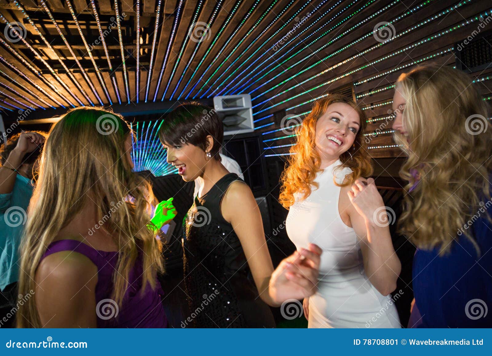 Group of Smiling Friends Dancing on Dance Floor Stock Image - Image of ...