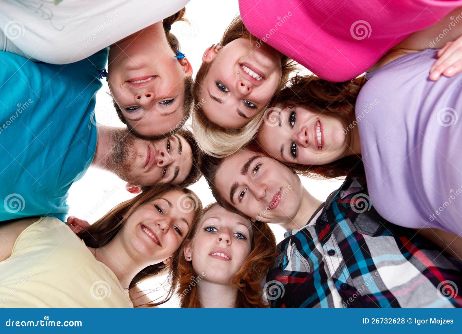 Group of Smiling Friends with Their Heads Together Stock Photo - Image ...