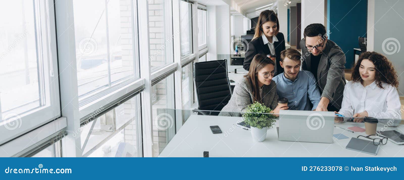 Group of Smiling Inspired Young Business People Working Together in ...