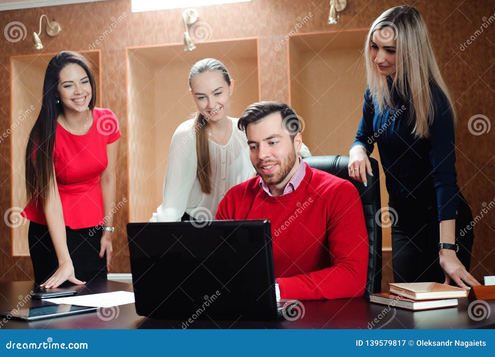 Group of Smiling Inspired Young Business People Working Together Stock ... Group of Smiling Inspired Young Business People Working Together Stock ...