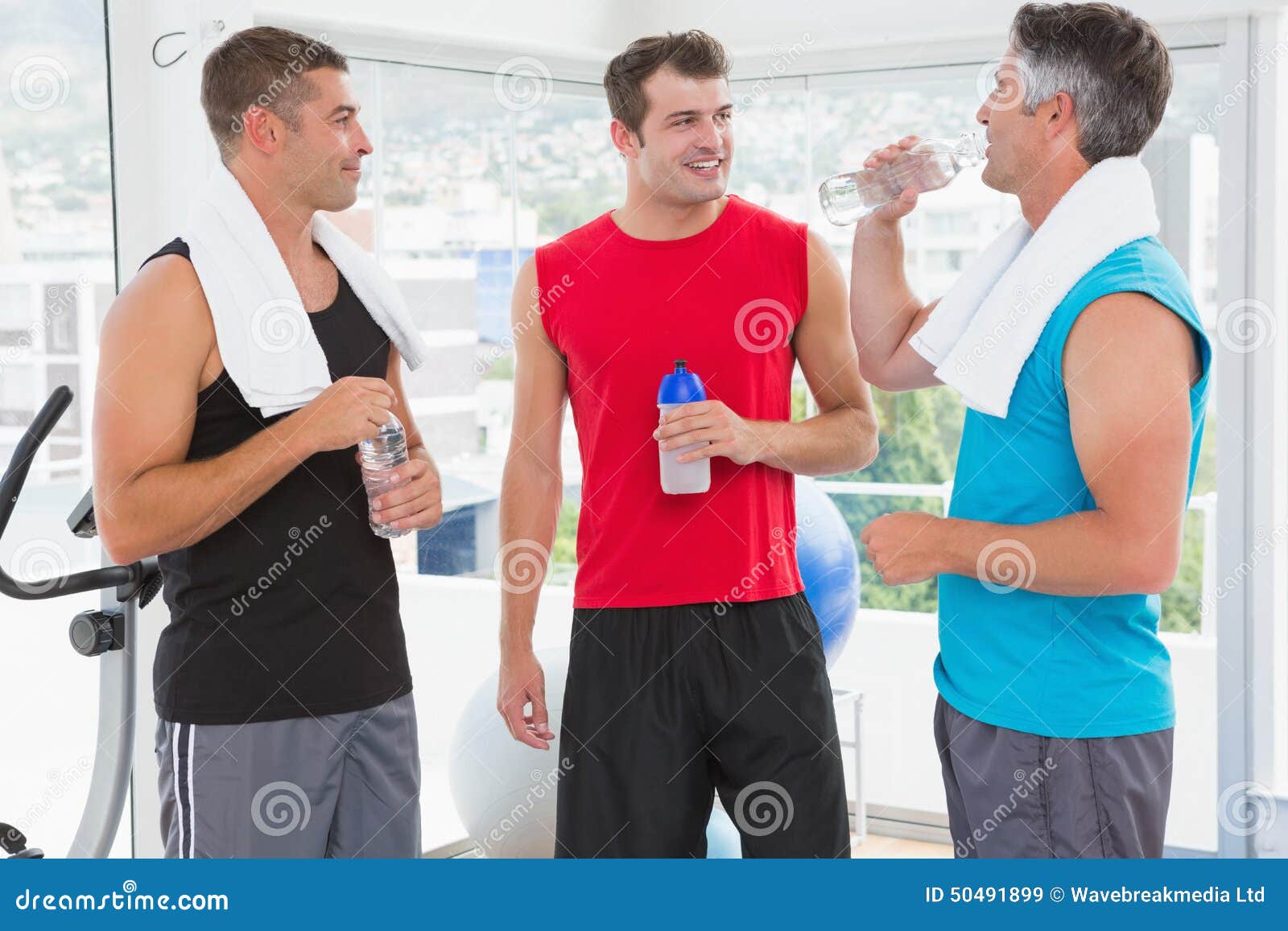 Group of Smiling Men Talking Each Other Stock Image - Image of ...