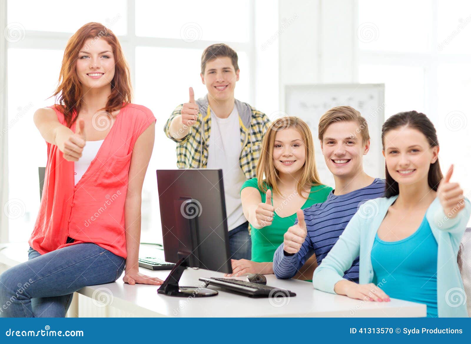 Group of Smiling Students Showing Thumbs Up Stock Photo - Image of ...