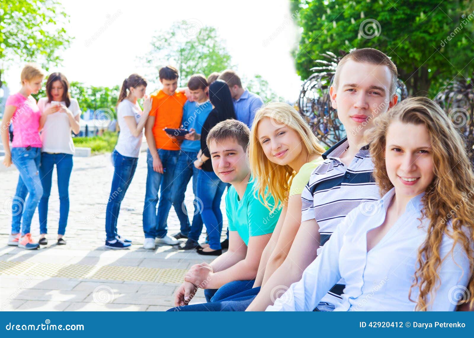 Group of Smiling Teenagers Outdoors Stock Photo - Image of female ...