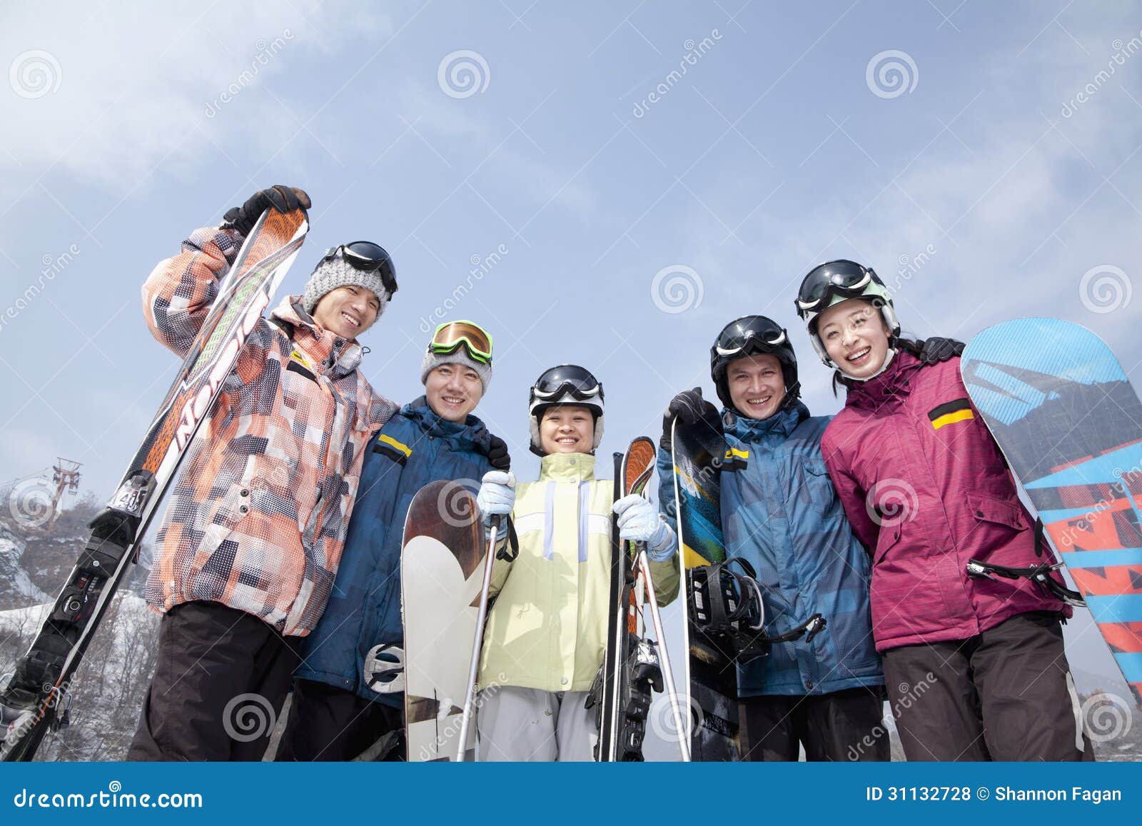 Group of Snowboarders in Ski Resort, Low Angle View Stock Photo - Image ...