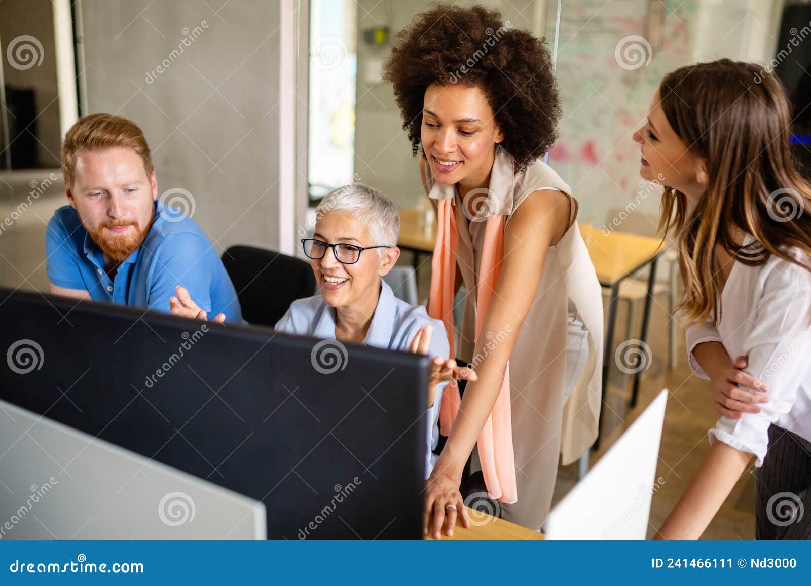 Group of Software Engineers Working Developing Applications Together in ...
