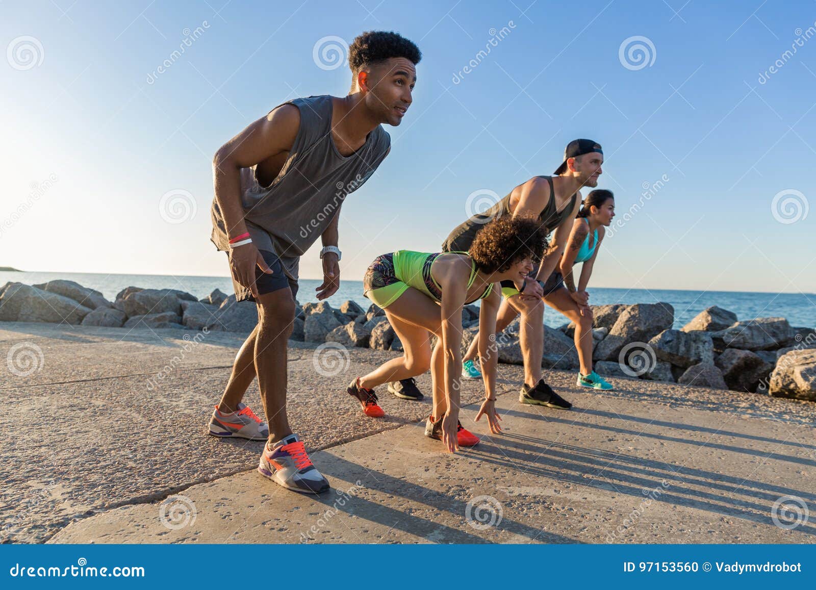 Group of Sporty People Getting Ready To Run a Marathon Stock Photo ...