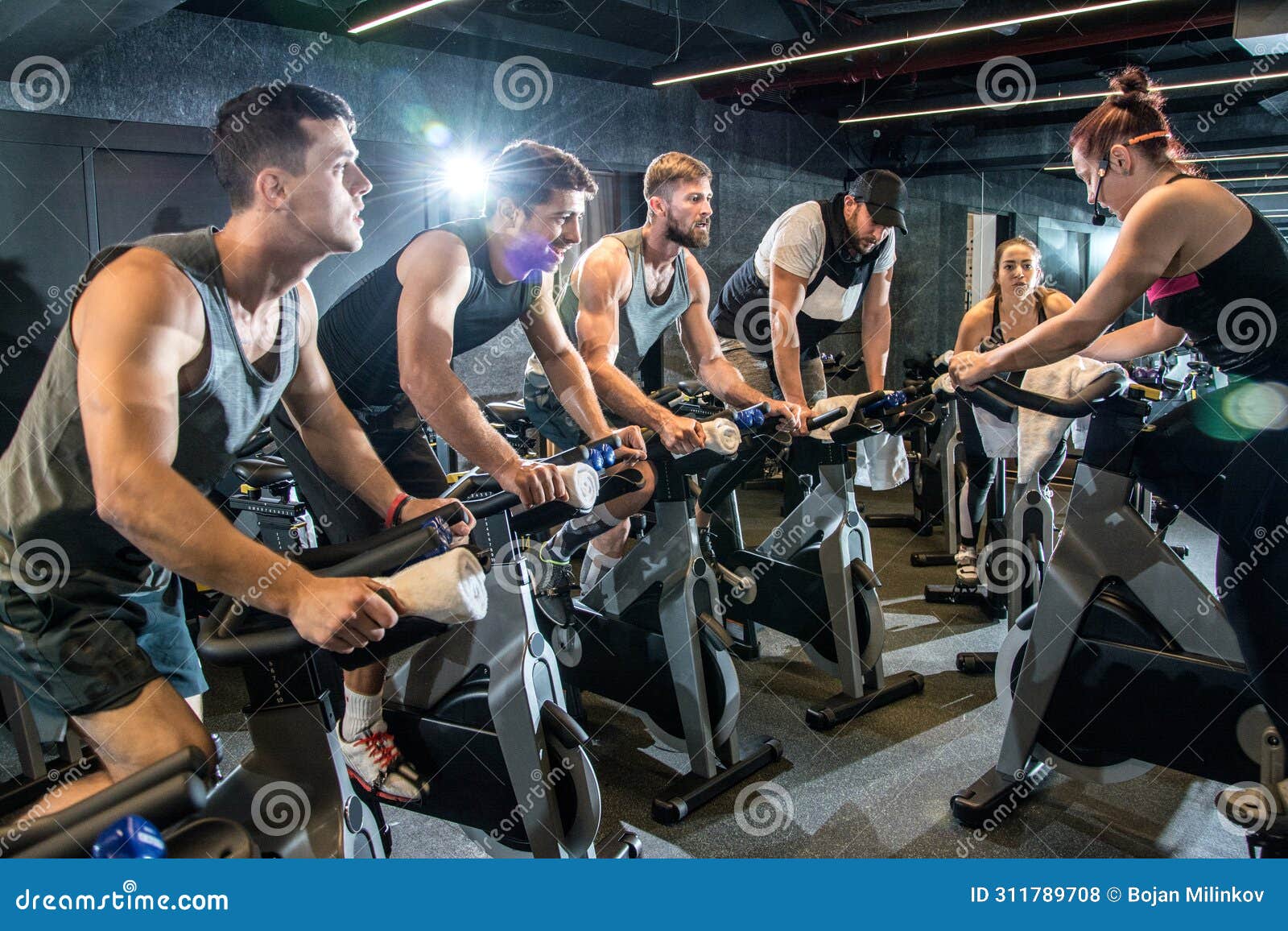 Group of Sporty People Having Spinning Class at Gym. Stock Photo ...