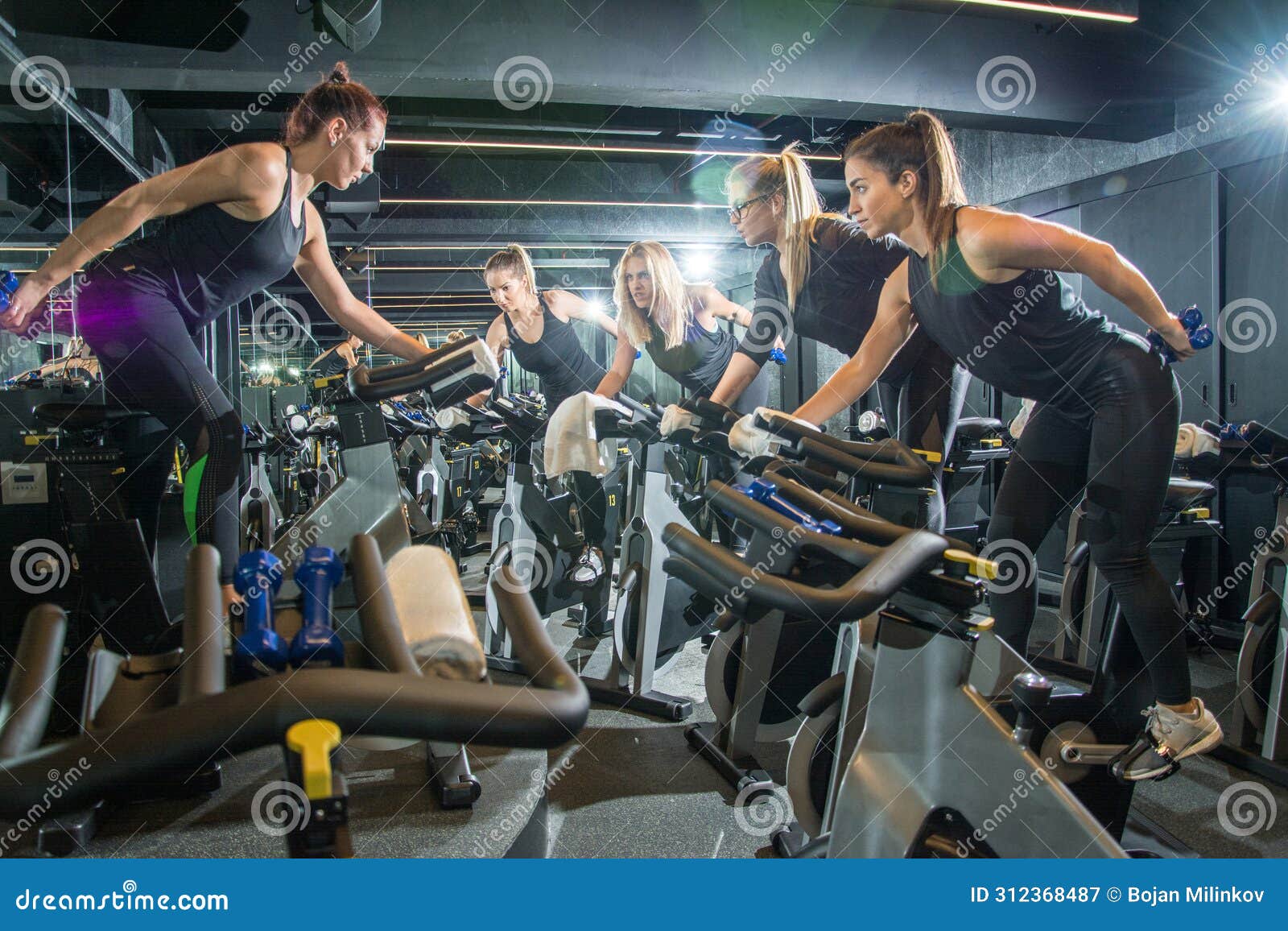 Group of Sporty Women on Spinning Class in Gym. Stock Image - Image of ...