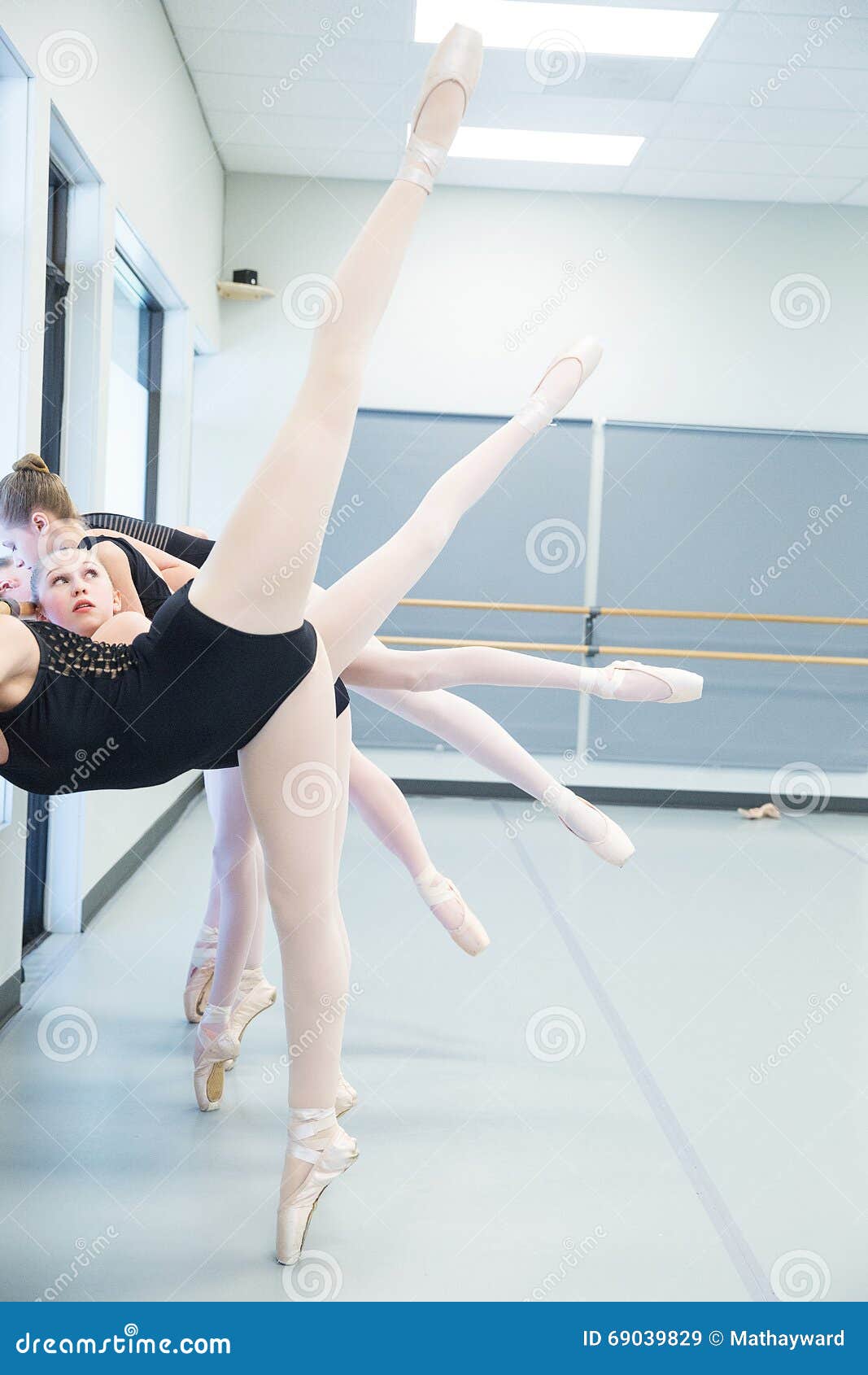 Group of Strong Young Dancers Forming a Pattern with Their Legs Stock ...