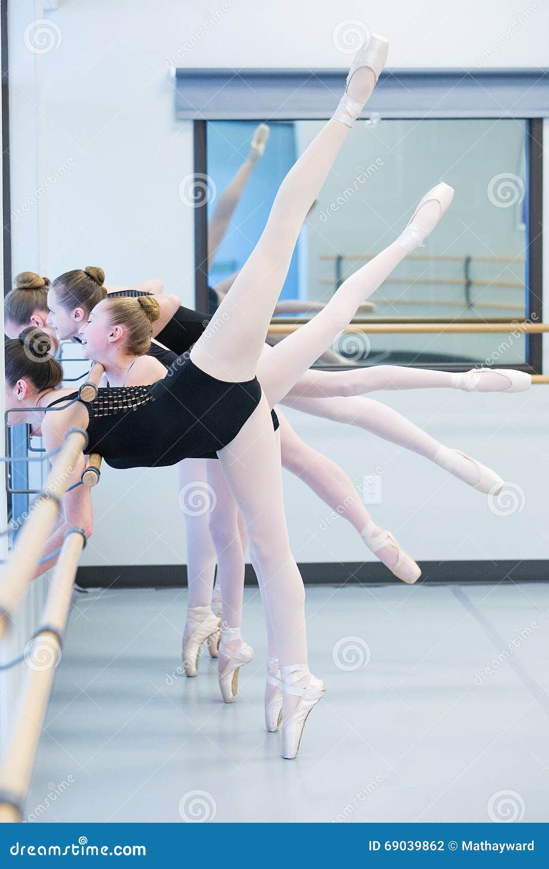 Group of Strong Young Dancers Forming a Pattern with Their Legs Stock ...