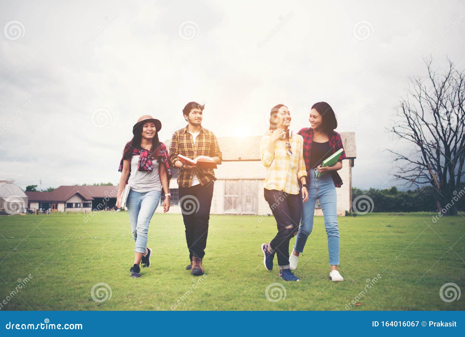 Group of Student Walking through the Park after Class. Stock Image ...