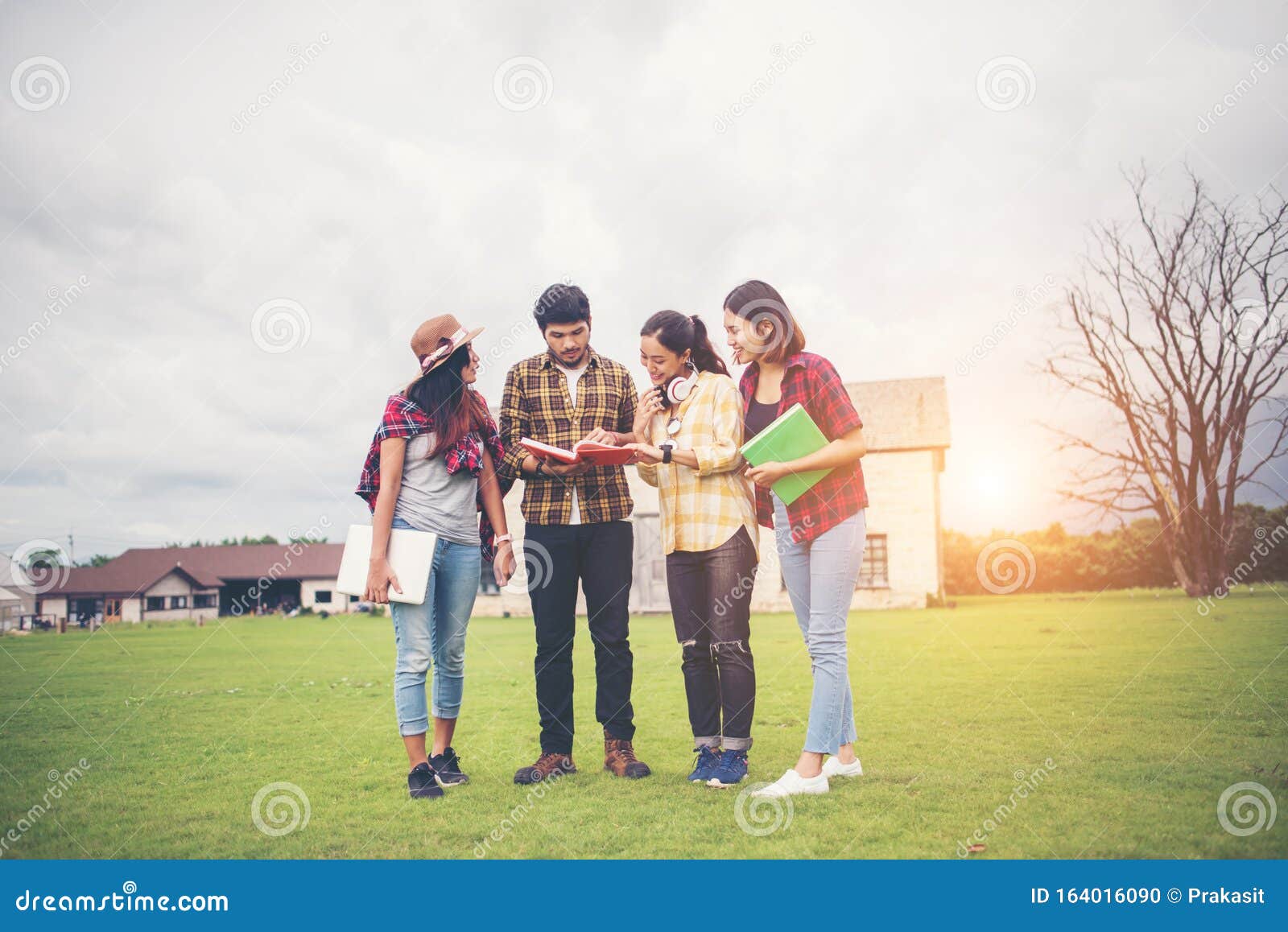 Group of Student Walking through the Park after Class. Stock Photo ...